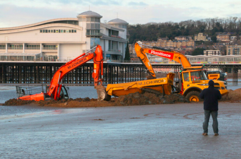 Rescue mission fails as tide swamps digger rescuing truck