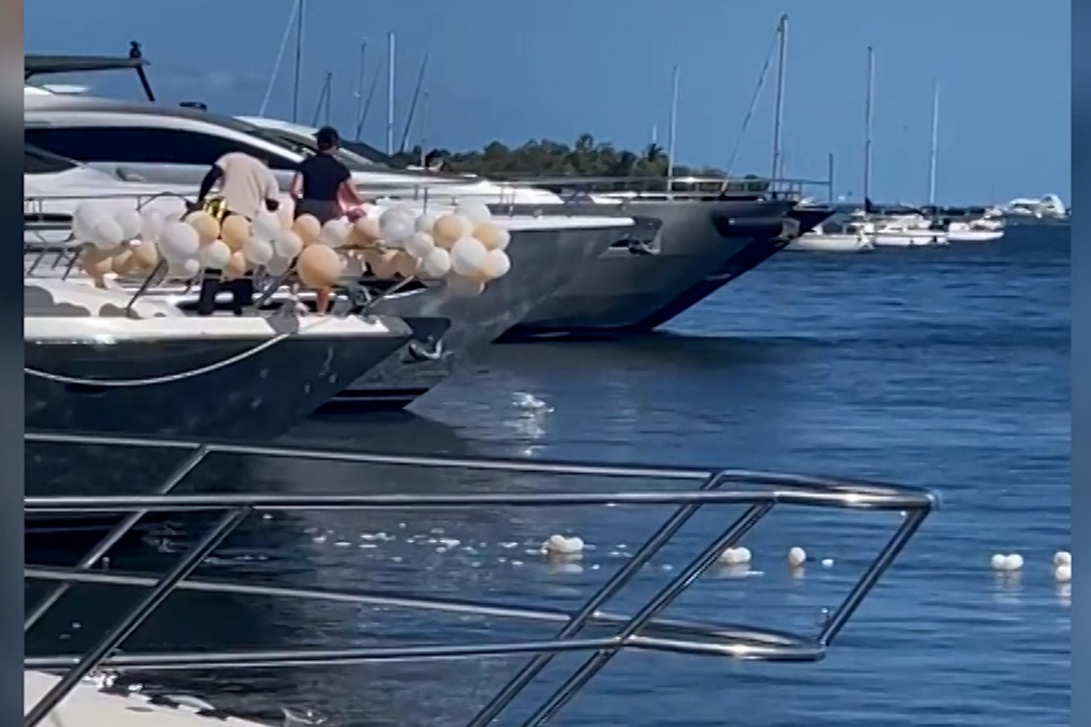 WATCH: Arrests made after event crew dump balloons into water