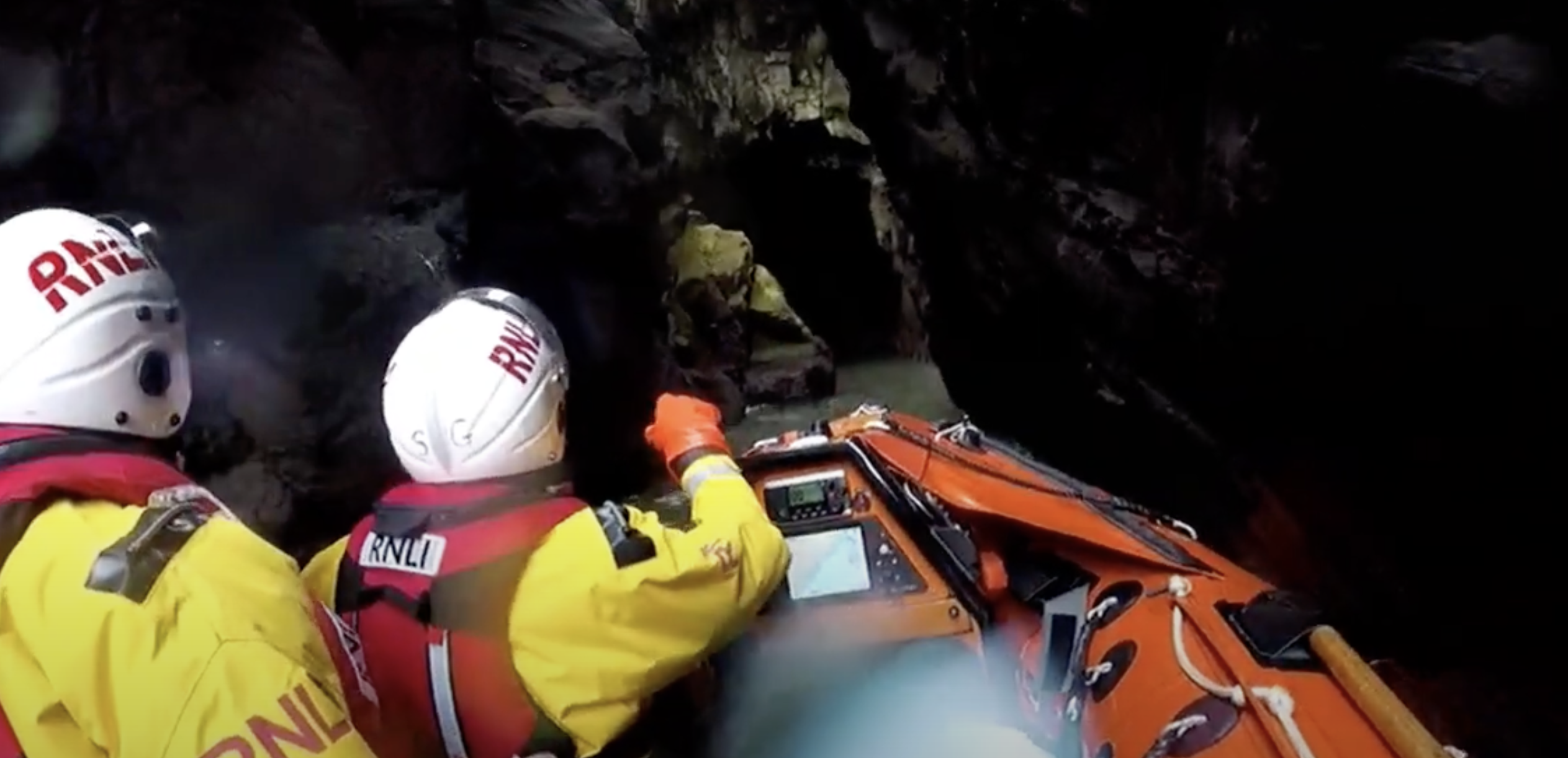 Watch: Lifeboat weaves through narrow tunnels to save dog in cliff fall ...